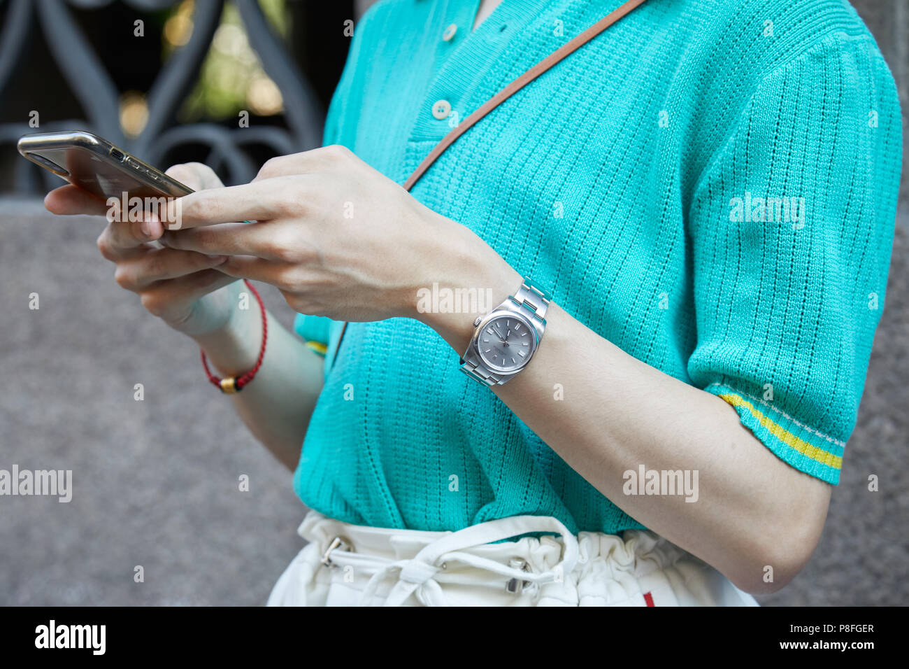 MILAN - JUNE 16: Man with Rolex watch with gray dial looking at ...