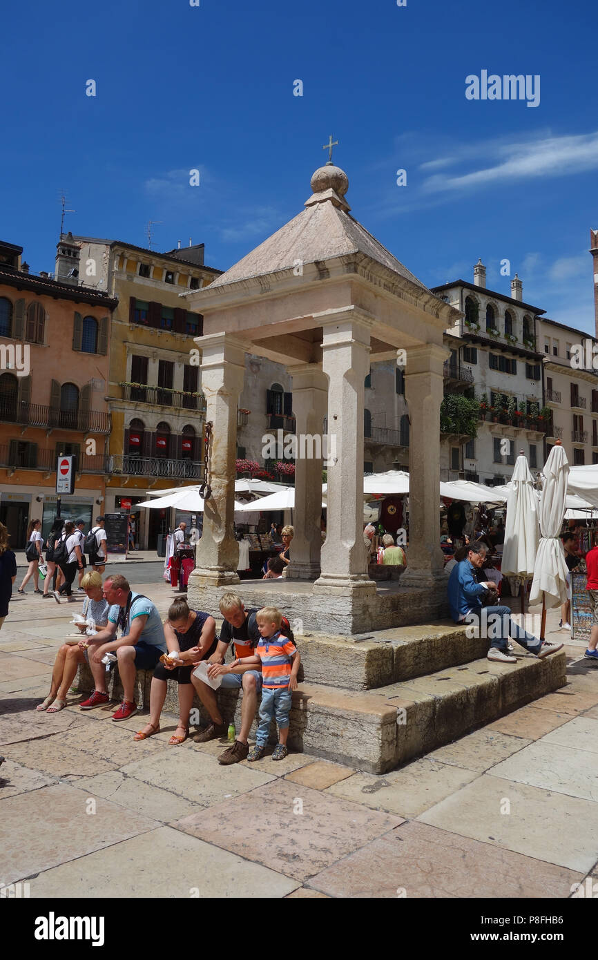 VERONA, ITALY - 14 JUNE 2018: People in the famous Piazza delle Erbei ...