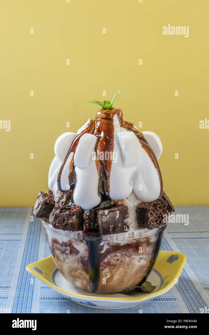 Bingsu - Korean shaved ice dessert with sweet toppings with chocolate ...