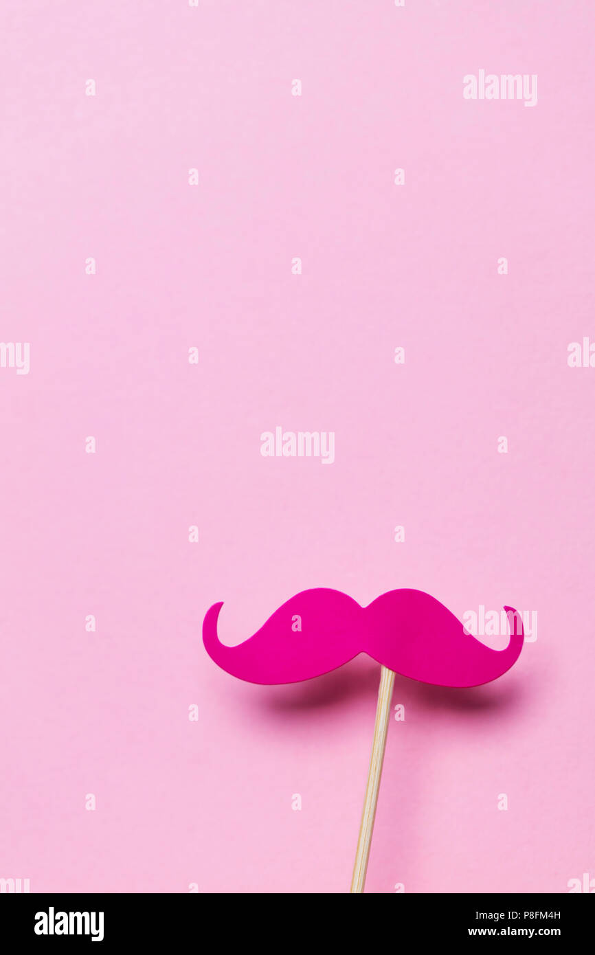 Pink moustache on a pink background. Modern masculinity concept Stock ...