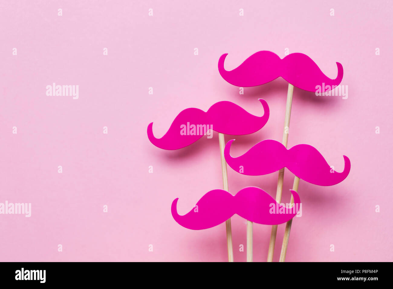 Pink moustache on a pink background. Modern masculinity concept Stock ...