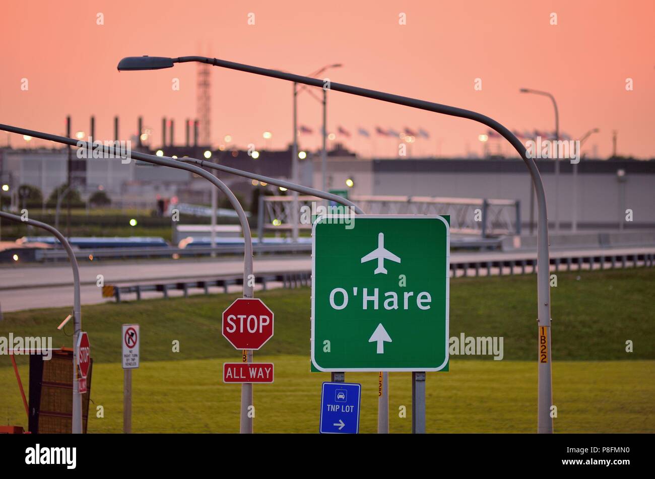 Chicago, Illinois, USA. A road sign provides direction to Chicago's O ...