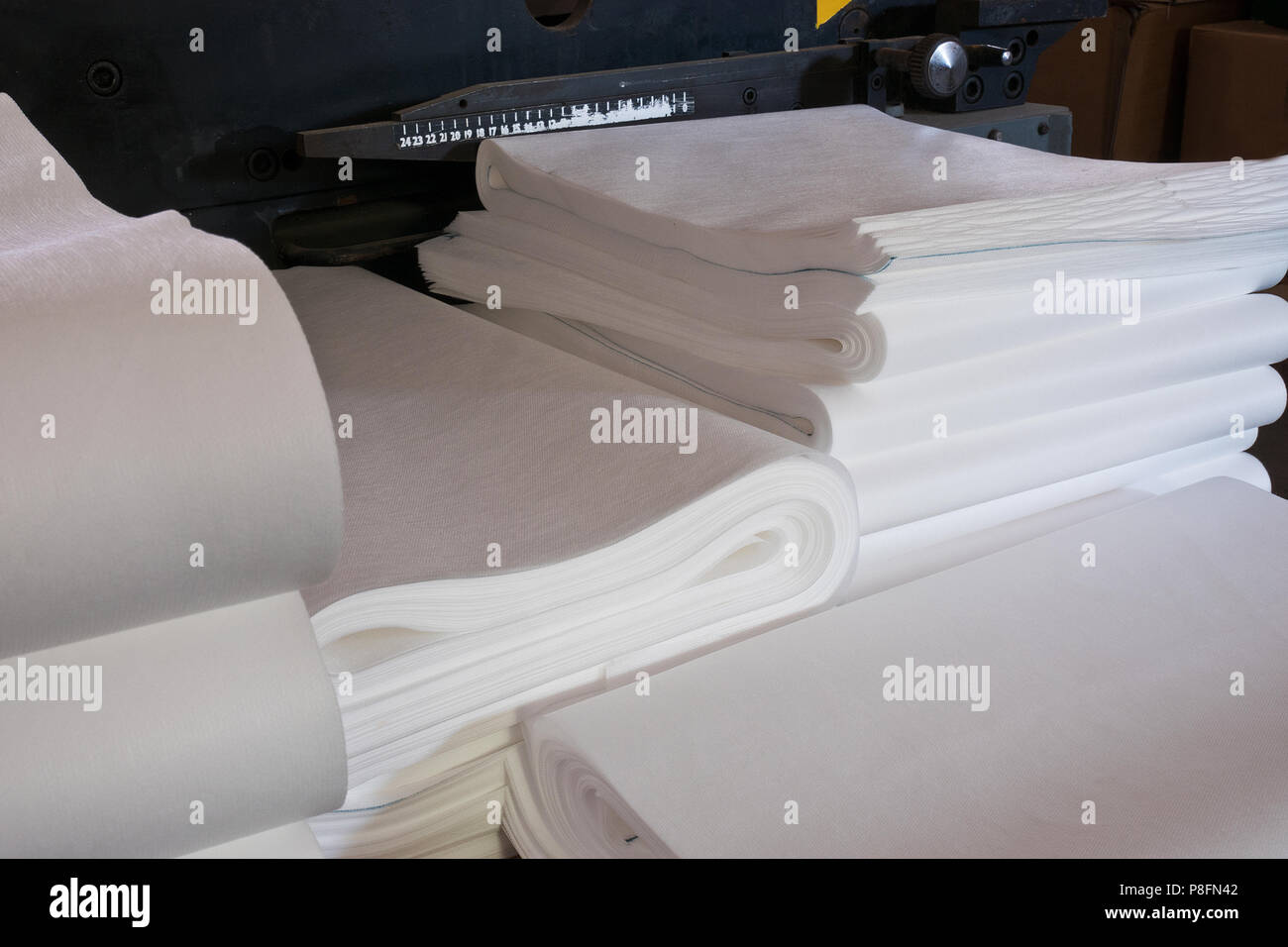A pile of paper in the factory Stock Photo - Alamy