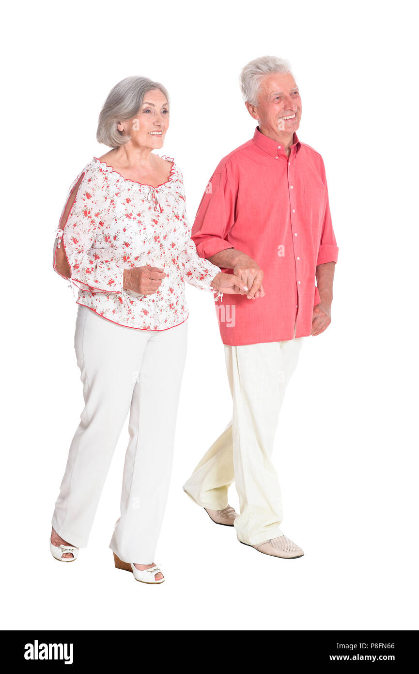 Happy retired couple holding Cut Out Stock Images & Pictures - Alamy