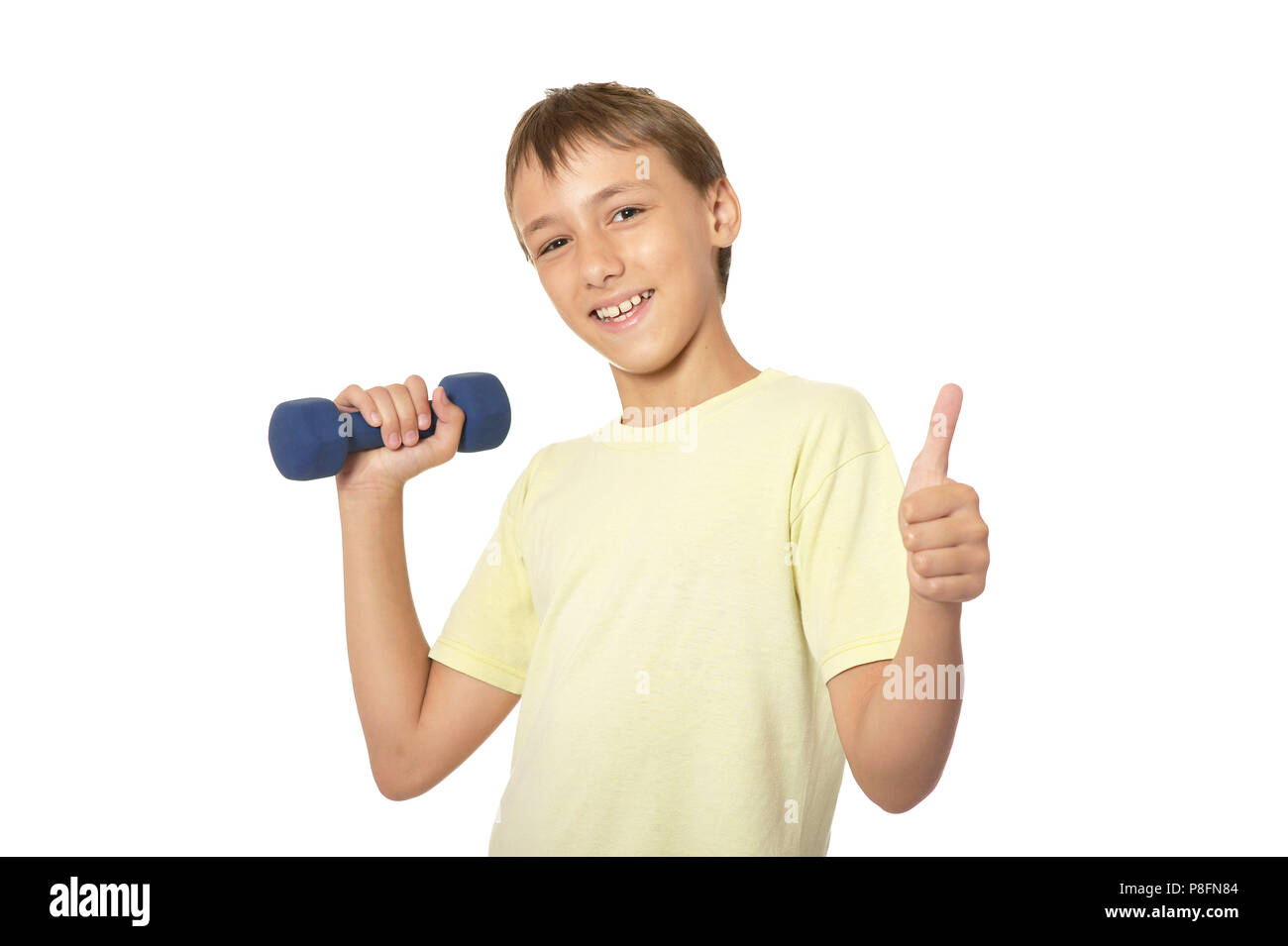Young boy doing exercises Stock Photo - Alamy