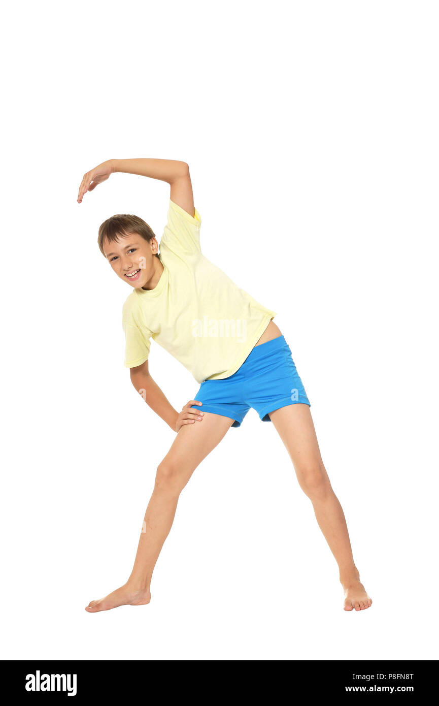 Young boy doing exercises Stock Photo - Alamy