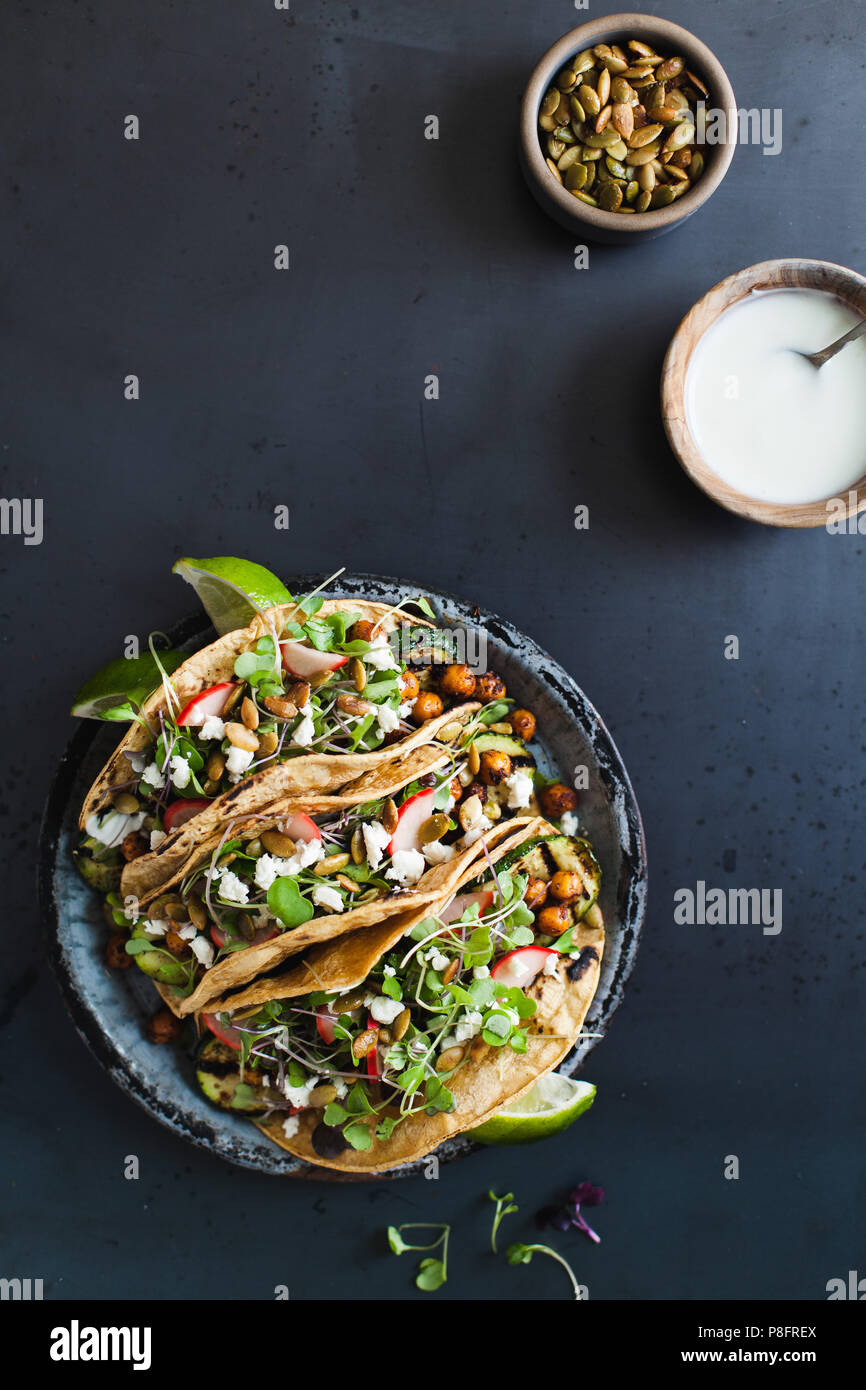 Vegetable tacos on blue background Stock Photo - Alamy