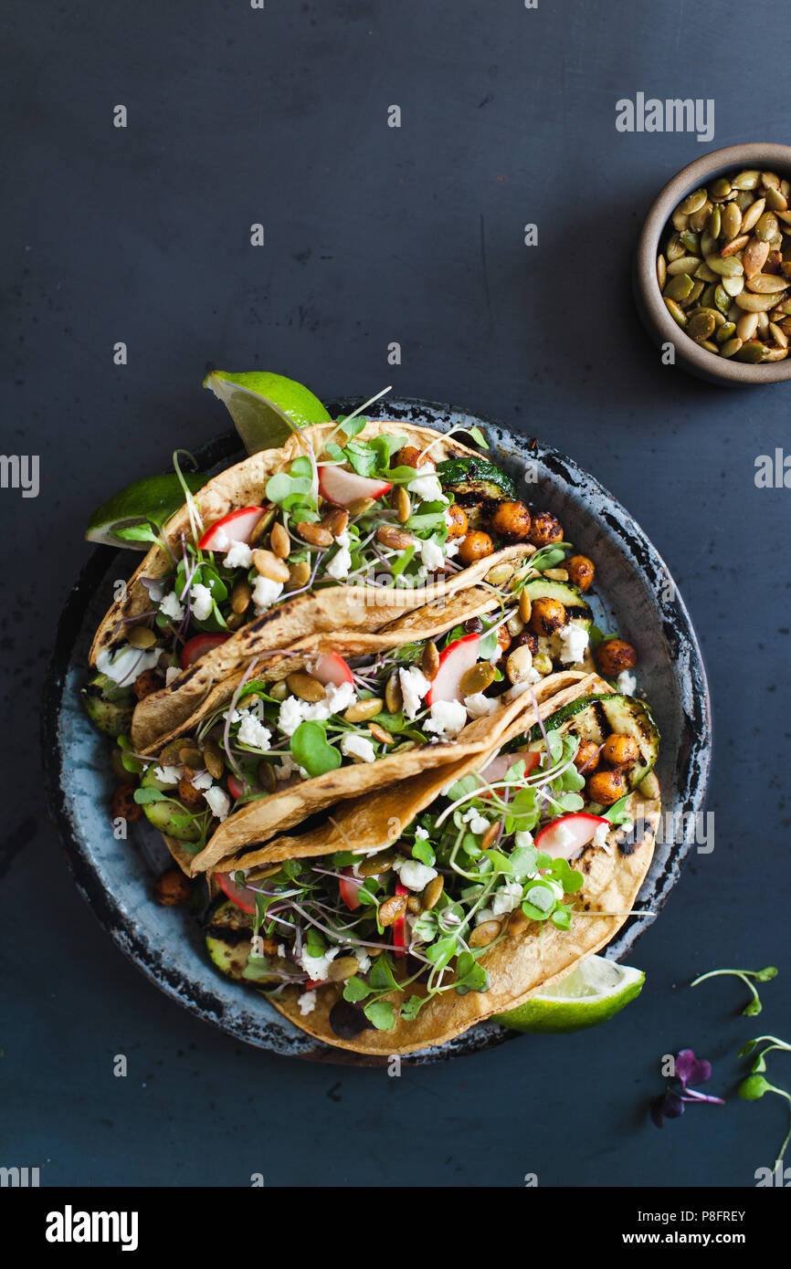 Vegetable tacos on blue background Stock Photo - Alamy