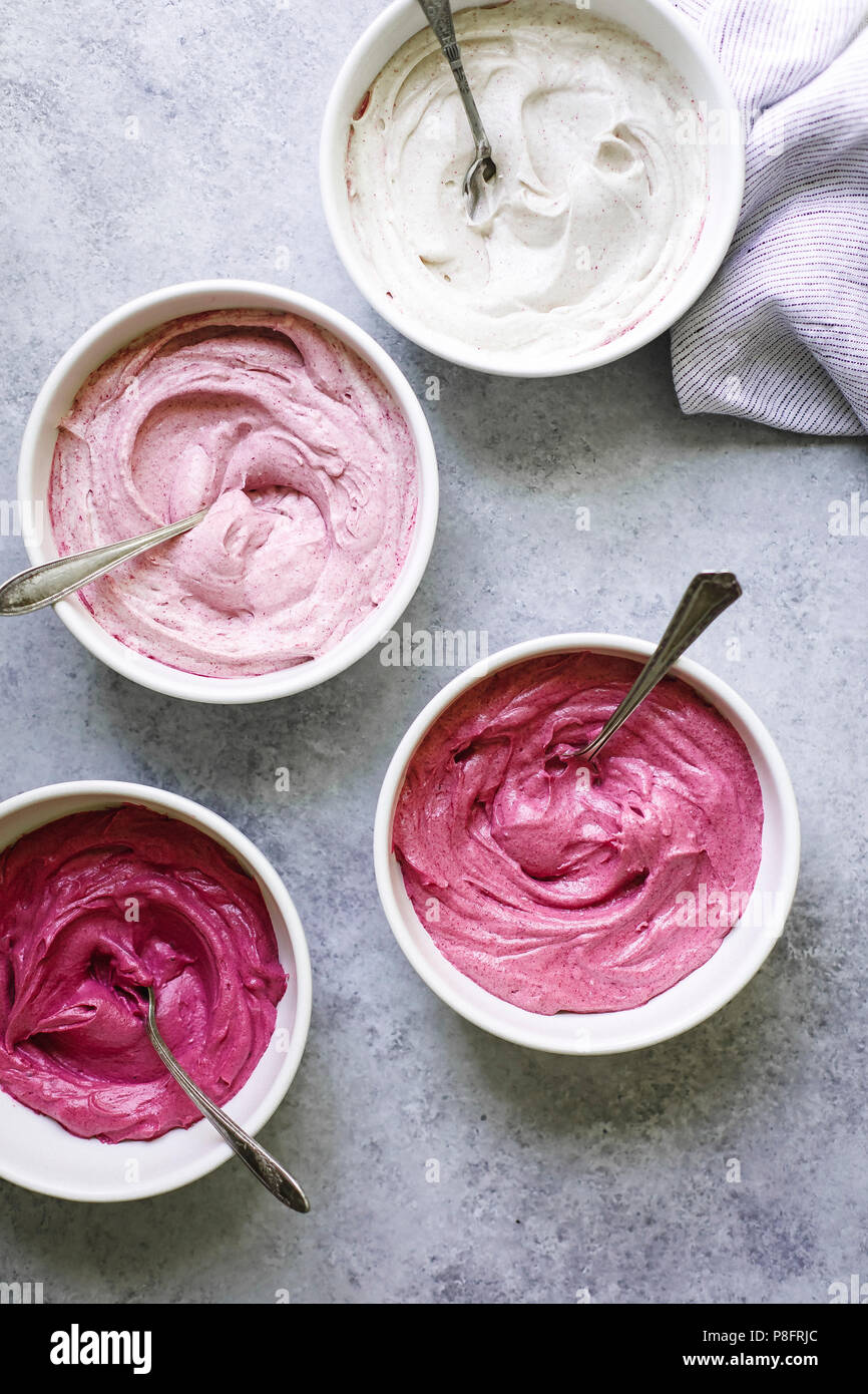 Pink frosting in bowls Stock Photo - Alamy