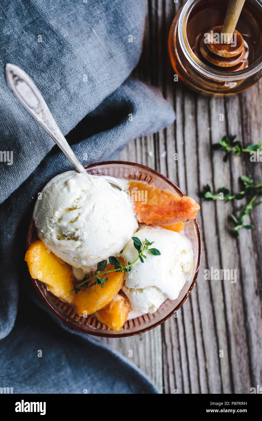 Honey & Lemon Thyme Ricotta Ice Cream with Vanilla Peaches Stock Photo ...