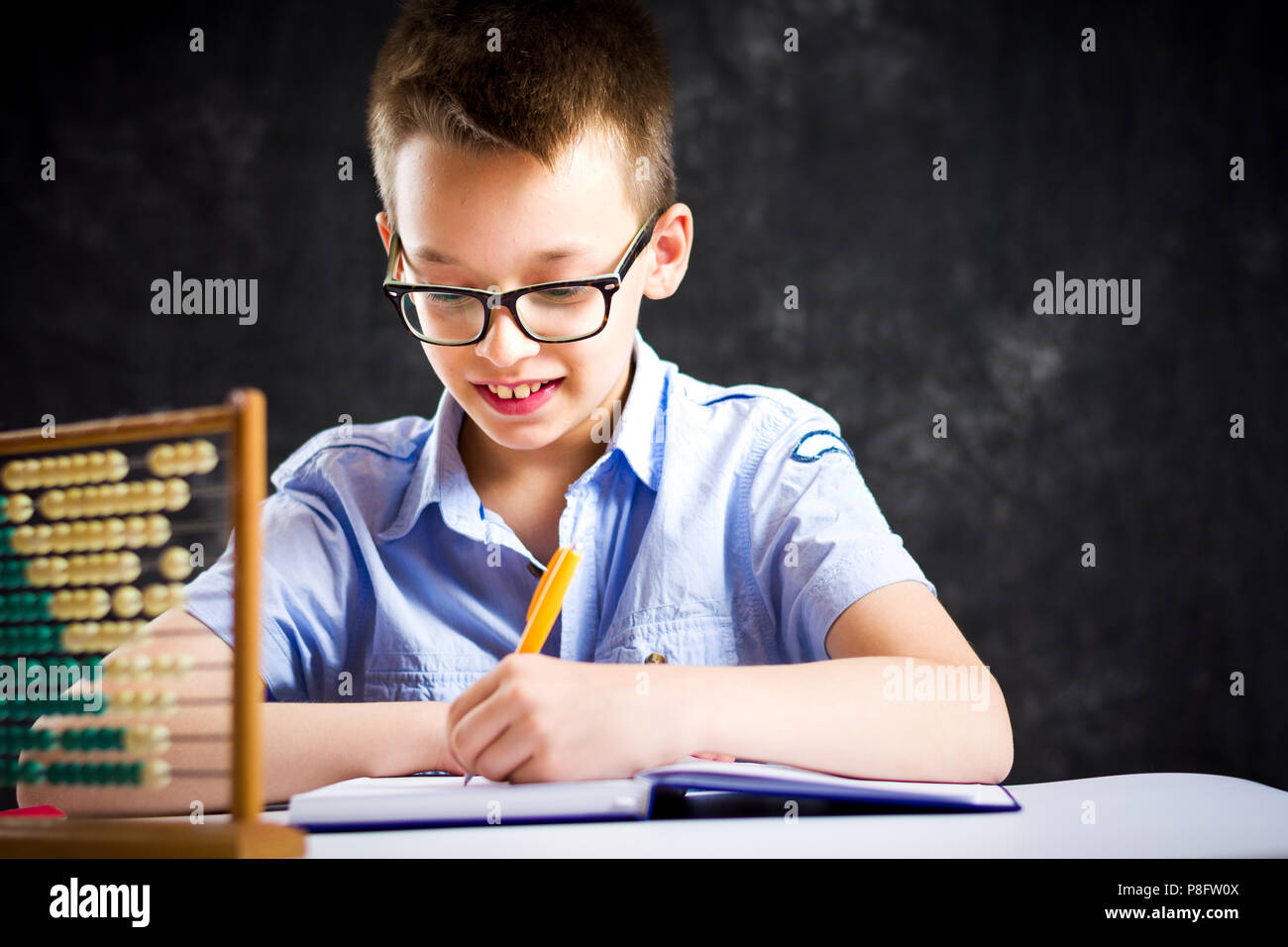 Solving homework hi-res stock photography and images - Alamy