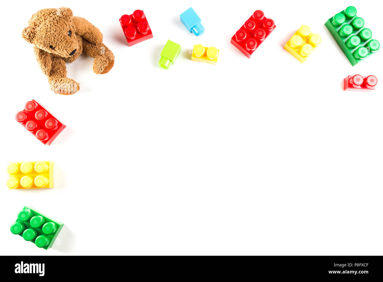Kids toys background with teddy bear and colorful blocks Stock Photo ...