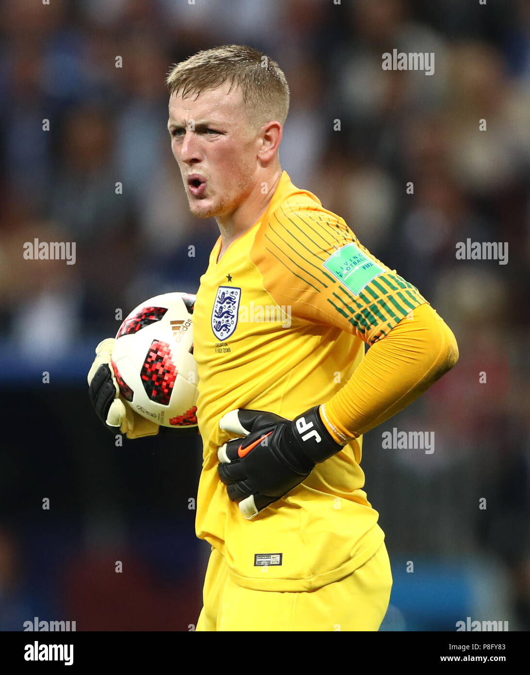 England goalkeeper Jordan Pickford reacts after his side concede during ...