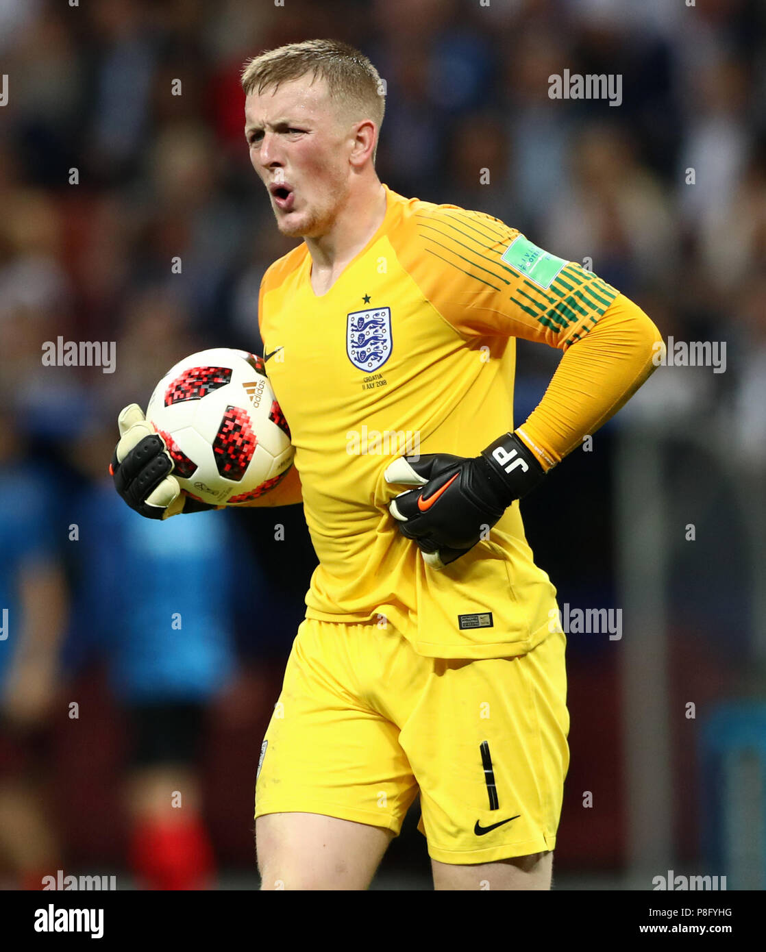 England goalkeeper Jordan Pickford reacts after his side concede during ...