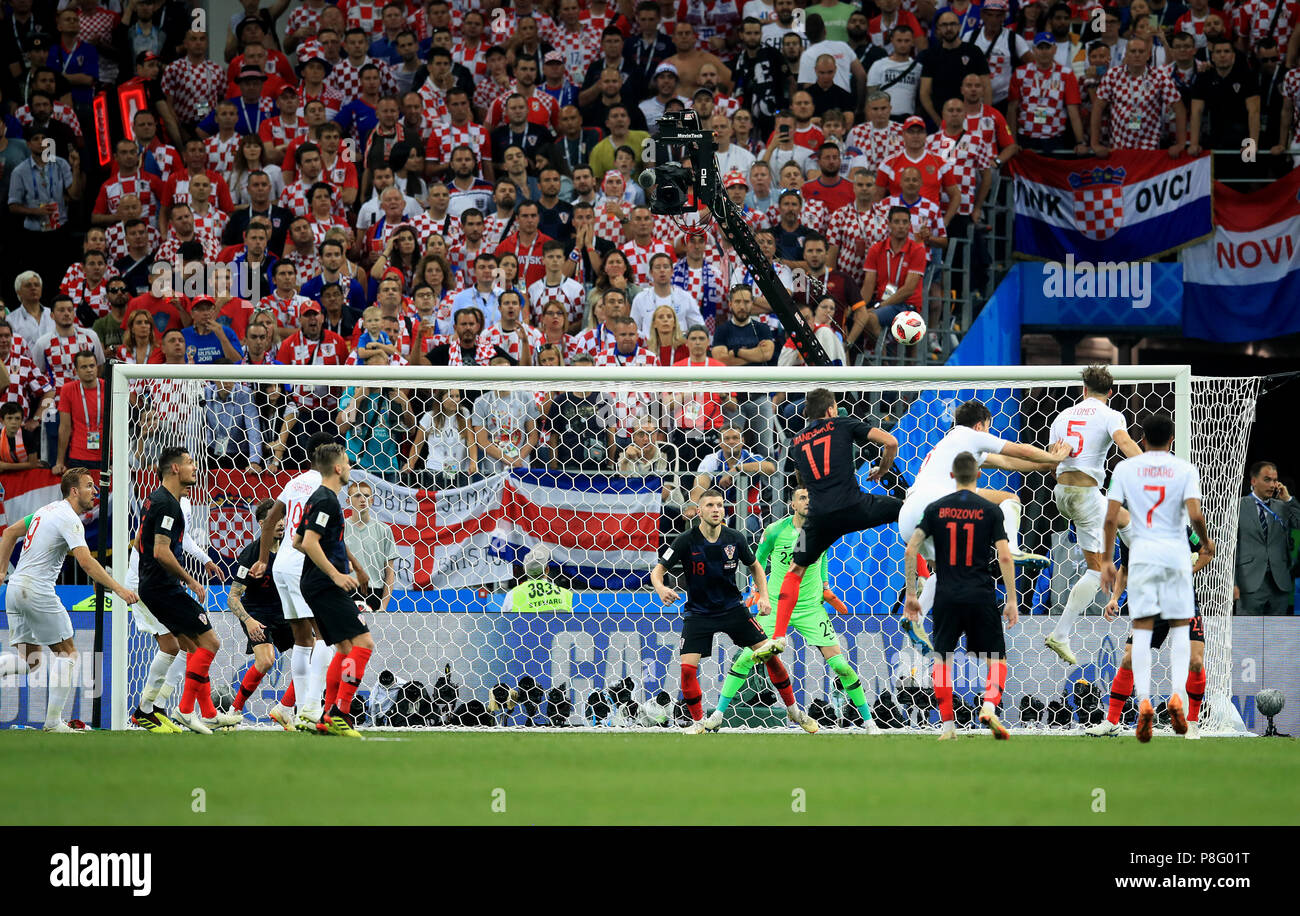 England's John Stones directs a header on goal in extra time during the ...