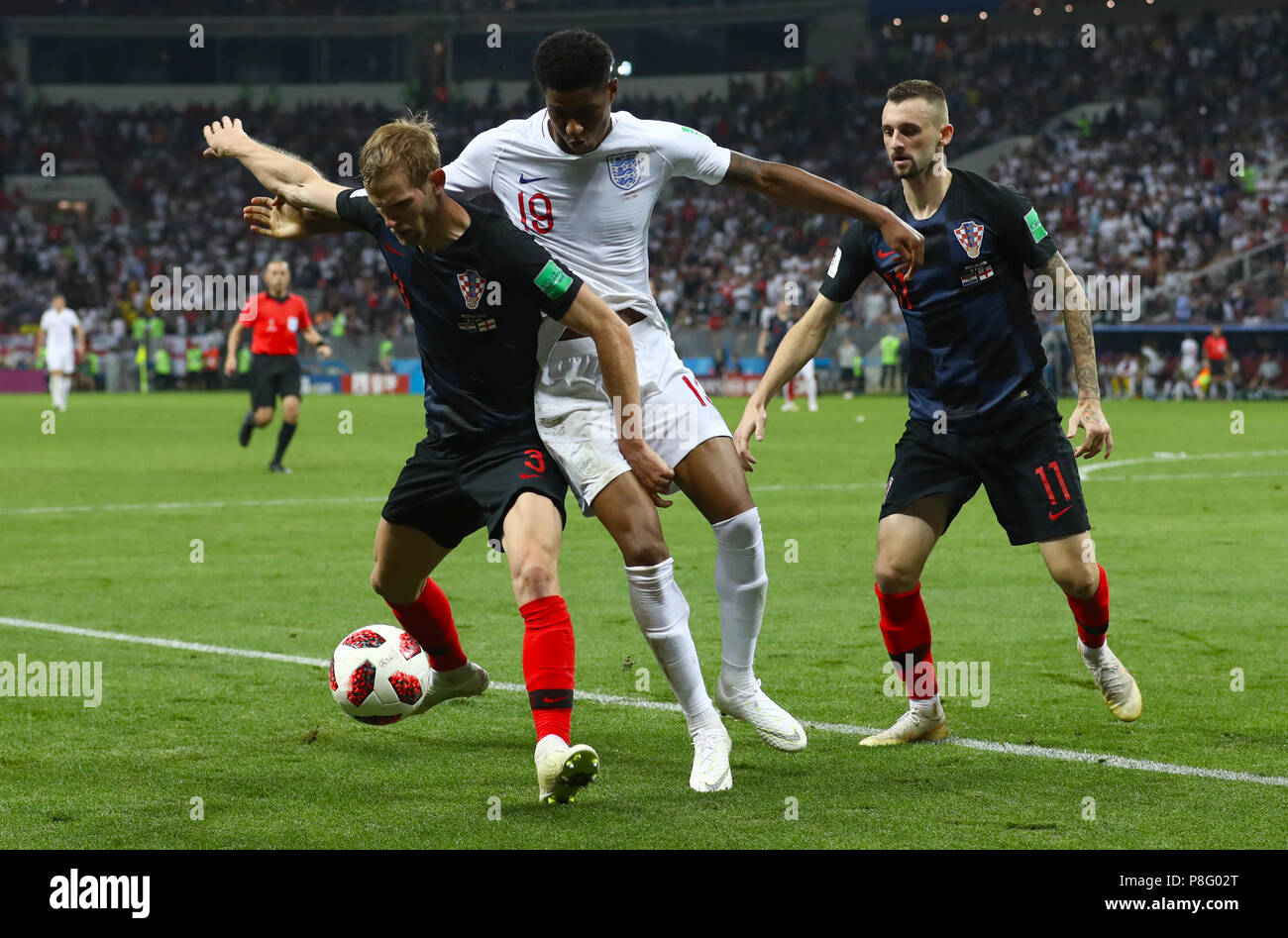 England's Marcus Rashford (centre) battles for the ball with Croatia's ...