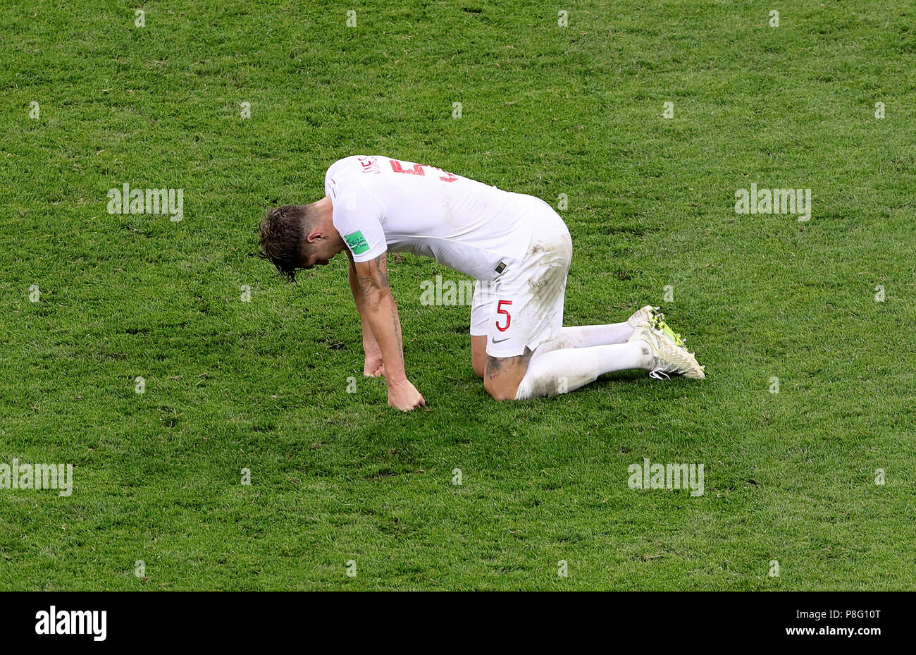 England's John Stones appears dejected after the final whistle during ...