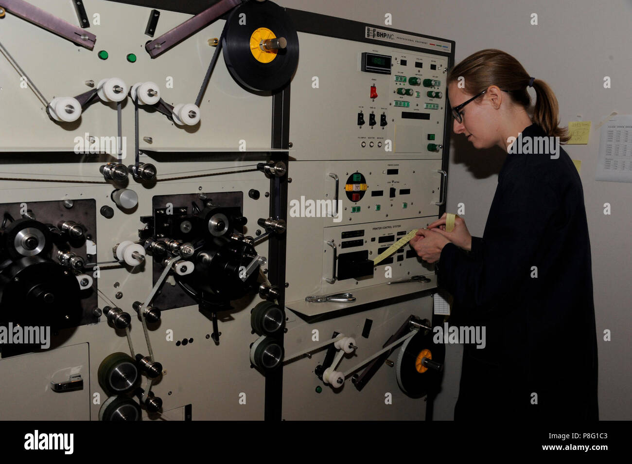 80th Anniversary Celebration . Heidi Holmstrom runs a data tape ...