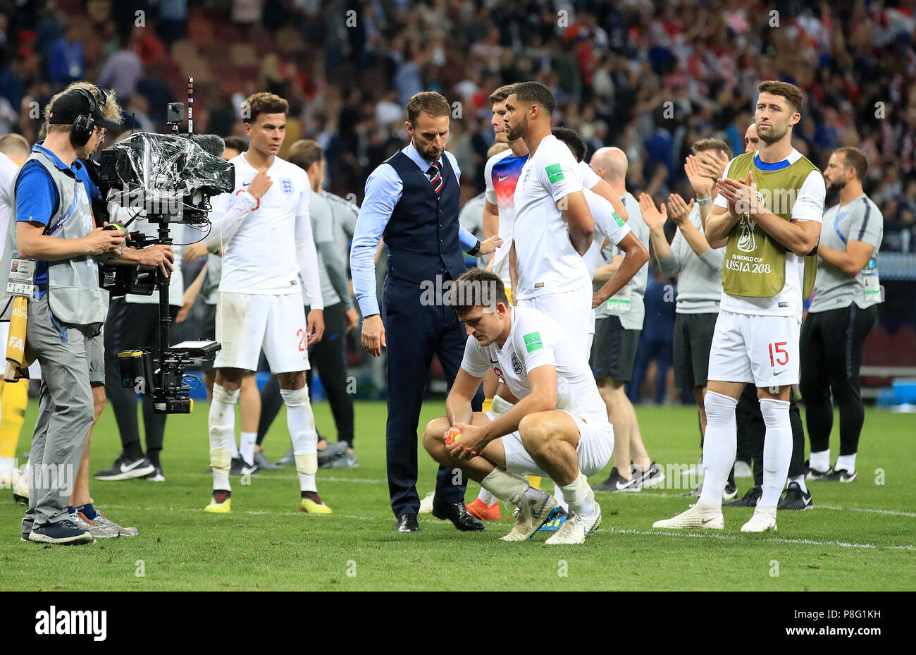 England's Harry Maguire and manager Gareth Southgate after the FIFA World Cup, Semi Final match ...
