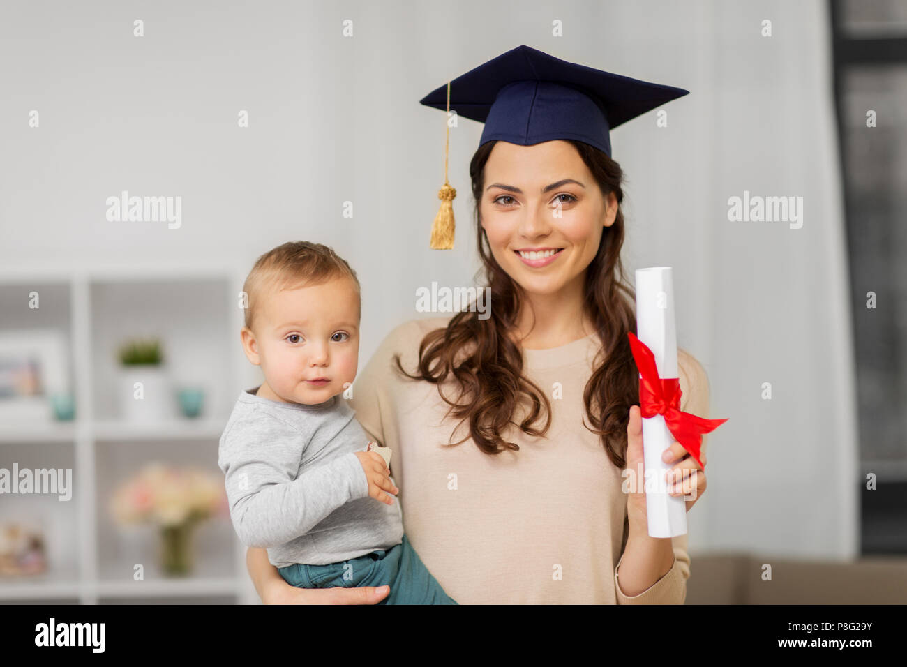 Young female graduating mother hi-res stock photography and images - Alamy