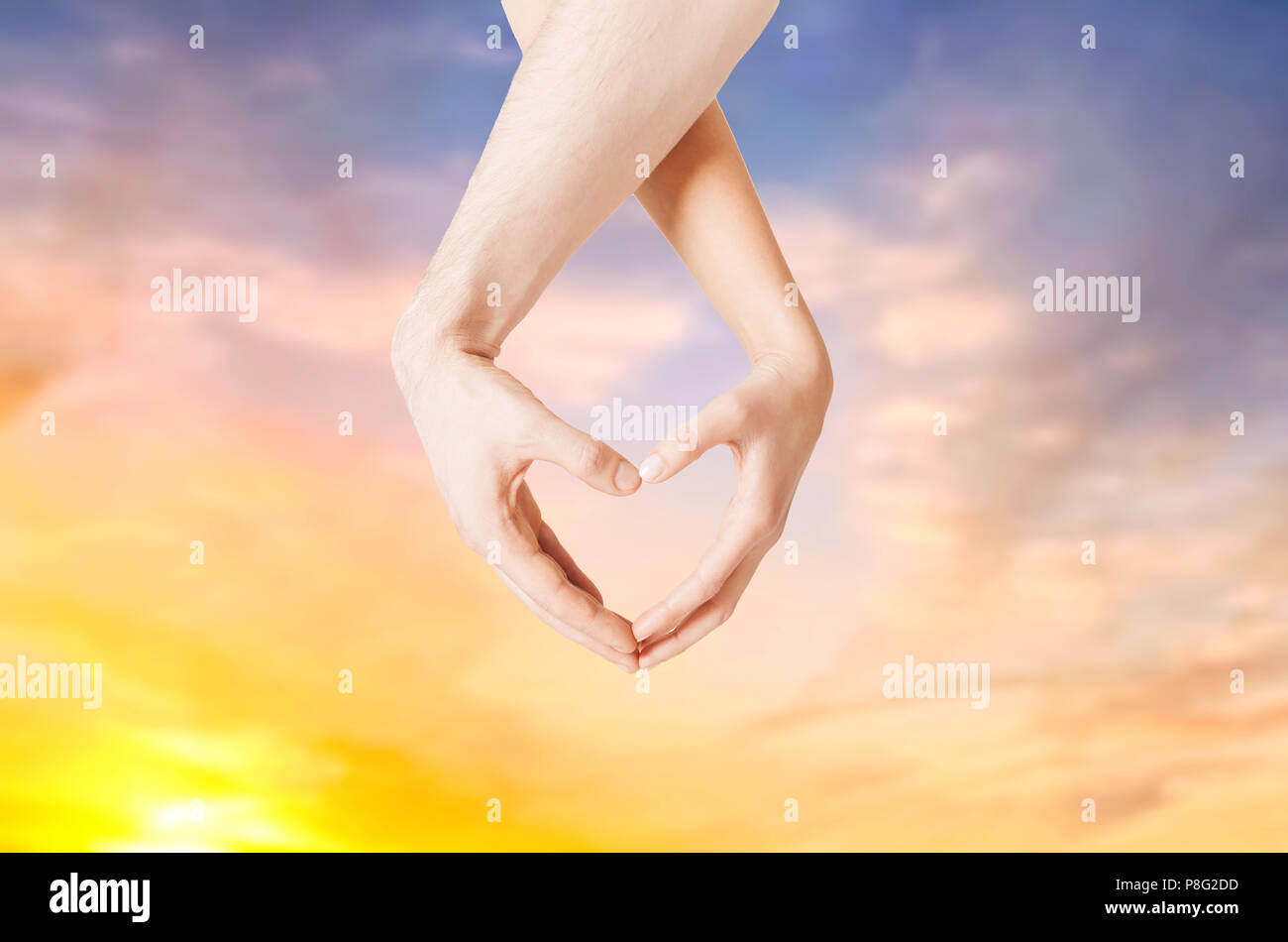 Couple hand heart hi-res stock photography and images - Alamy