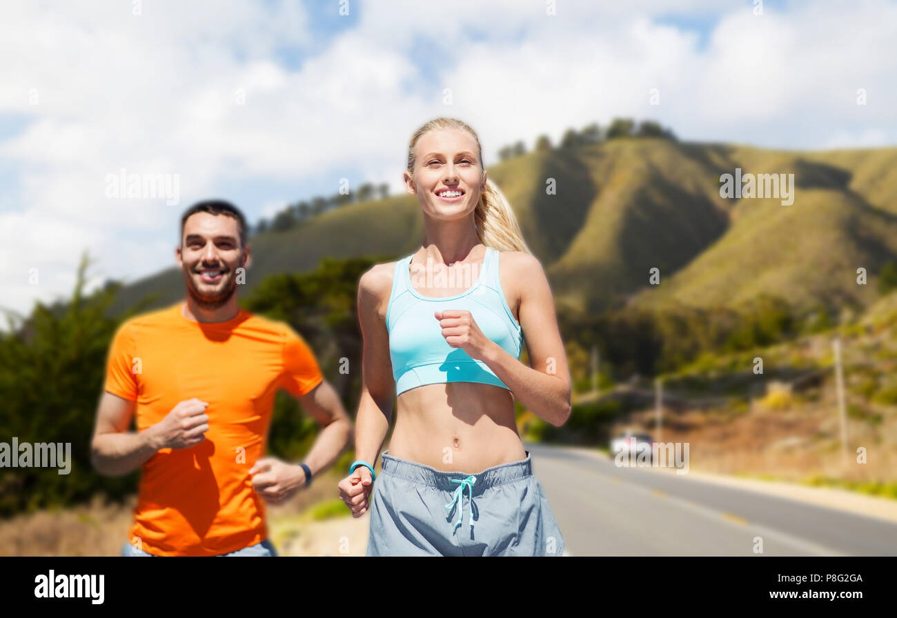 Sporty man running on hills hi-res stock photography and images - Alamy