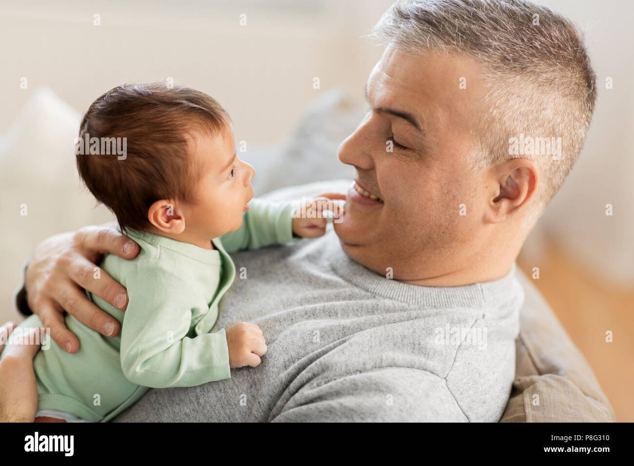 happy father with little baby boy at home Stock Photo - Alamy