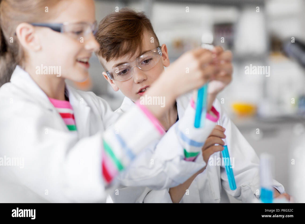 kids with test tubes studying chemistry at school Stock Photo - Alamy
