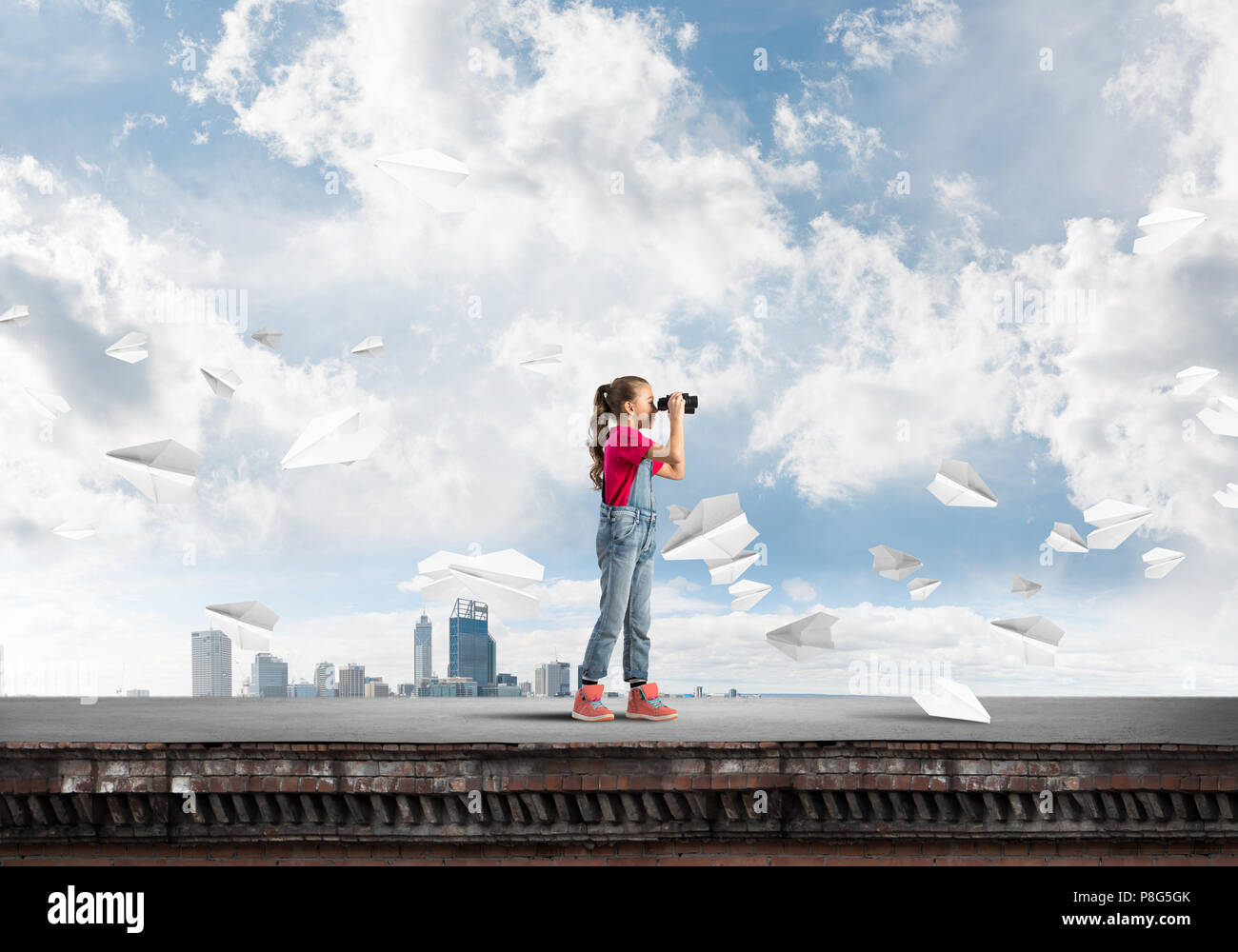 Concept of careless happy childhood with girl of school age looking in ...