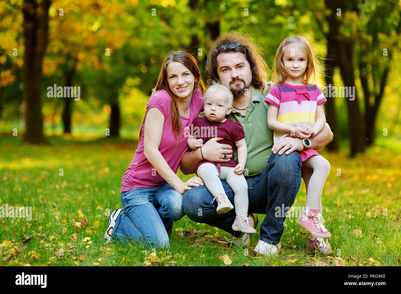 Positive family four people hi-res stock photography and images - Alamy