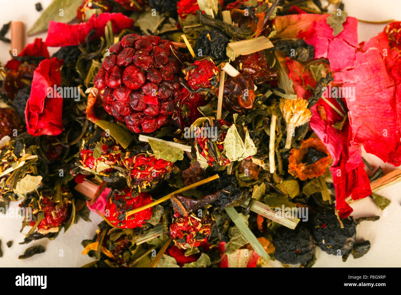 Aroma tea heap with fruit, berries and herbs Stock Photo - Alamy