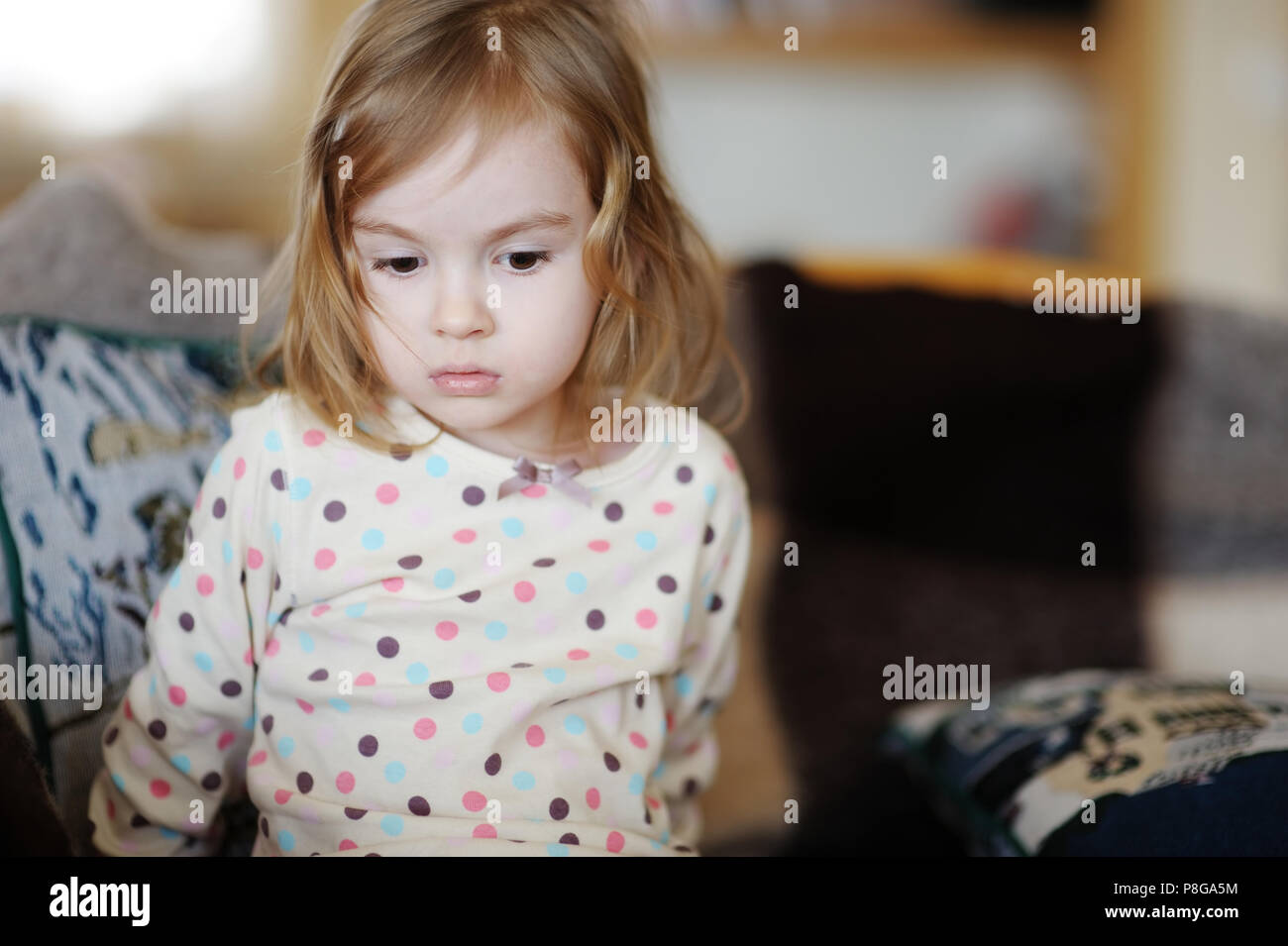 Sad little girl portrait Stock Photo - Alamy