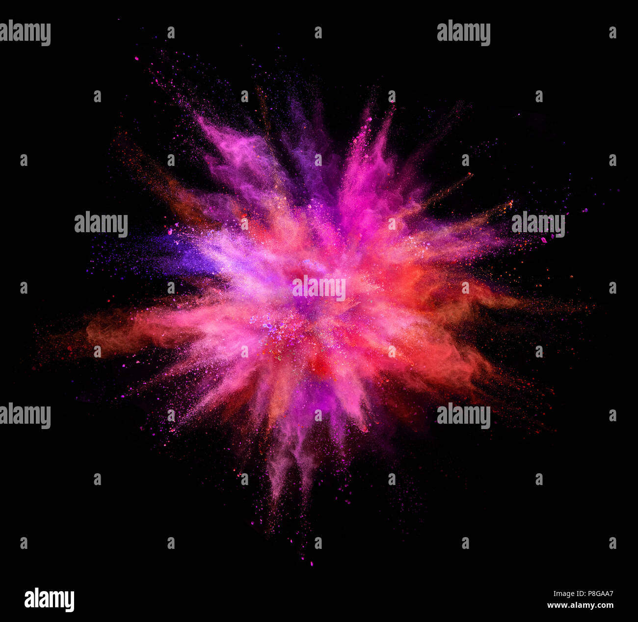Explosion of coloured powder isolated on black background Stock Photo ...