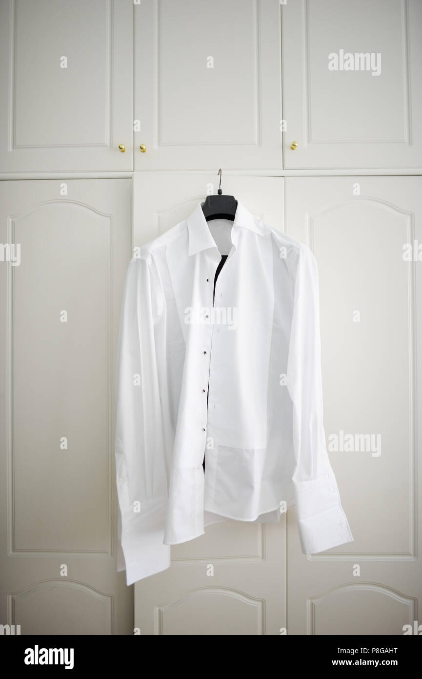 Shirt hanging on hook hi-res stock photography and images - Alamy