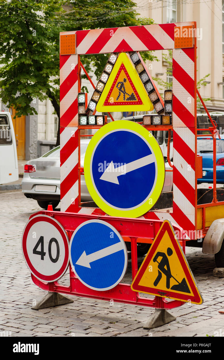 Road signs for road marking when repairing a road Stock Photo - Alamy