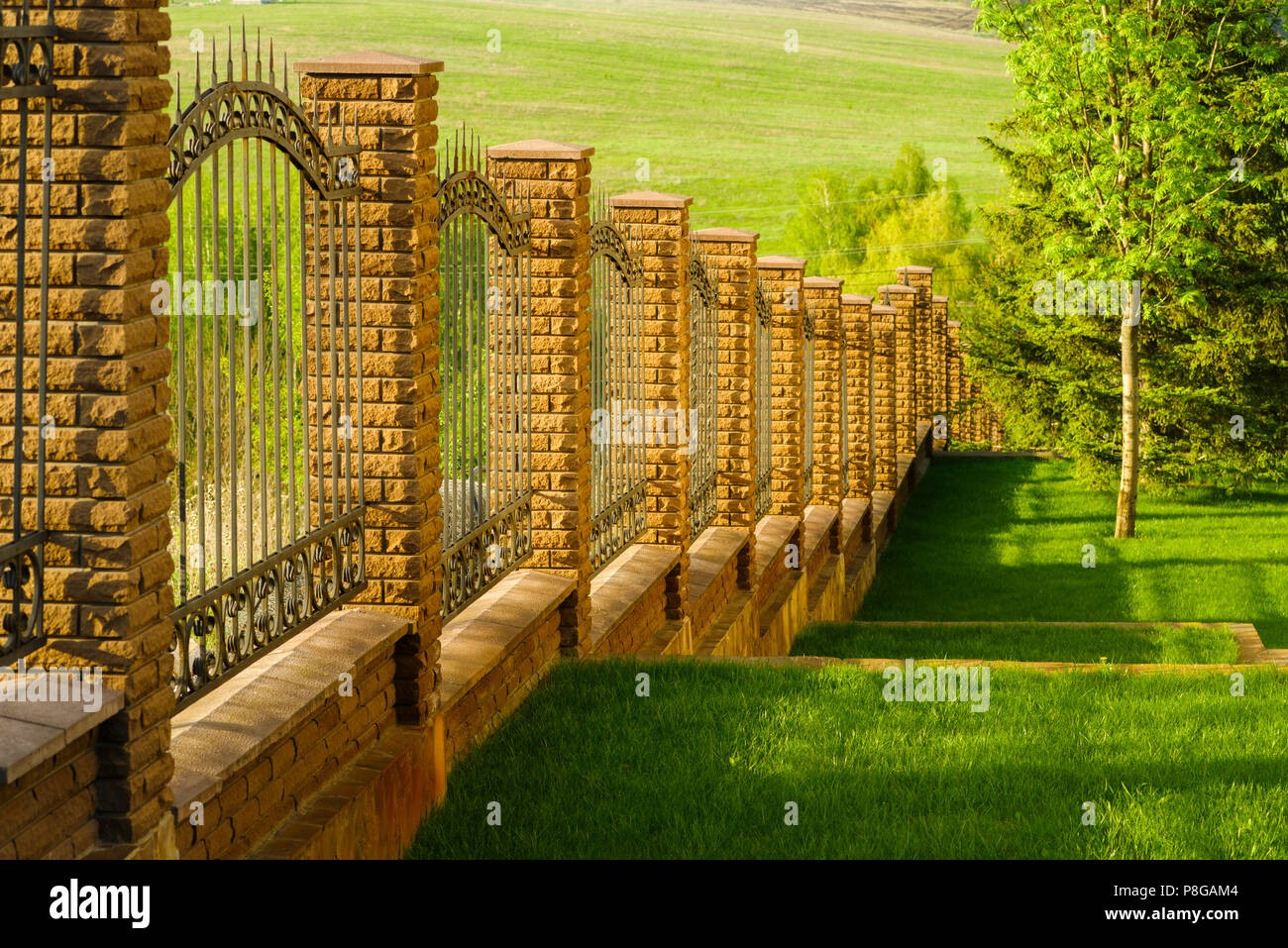 Park fence made forged hi-res stock photography and images - Alamy