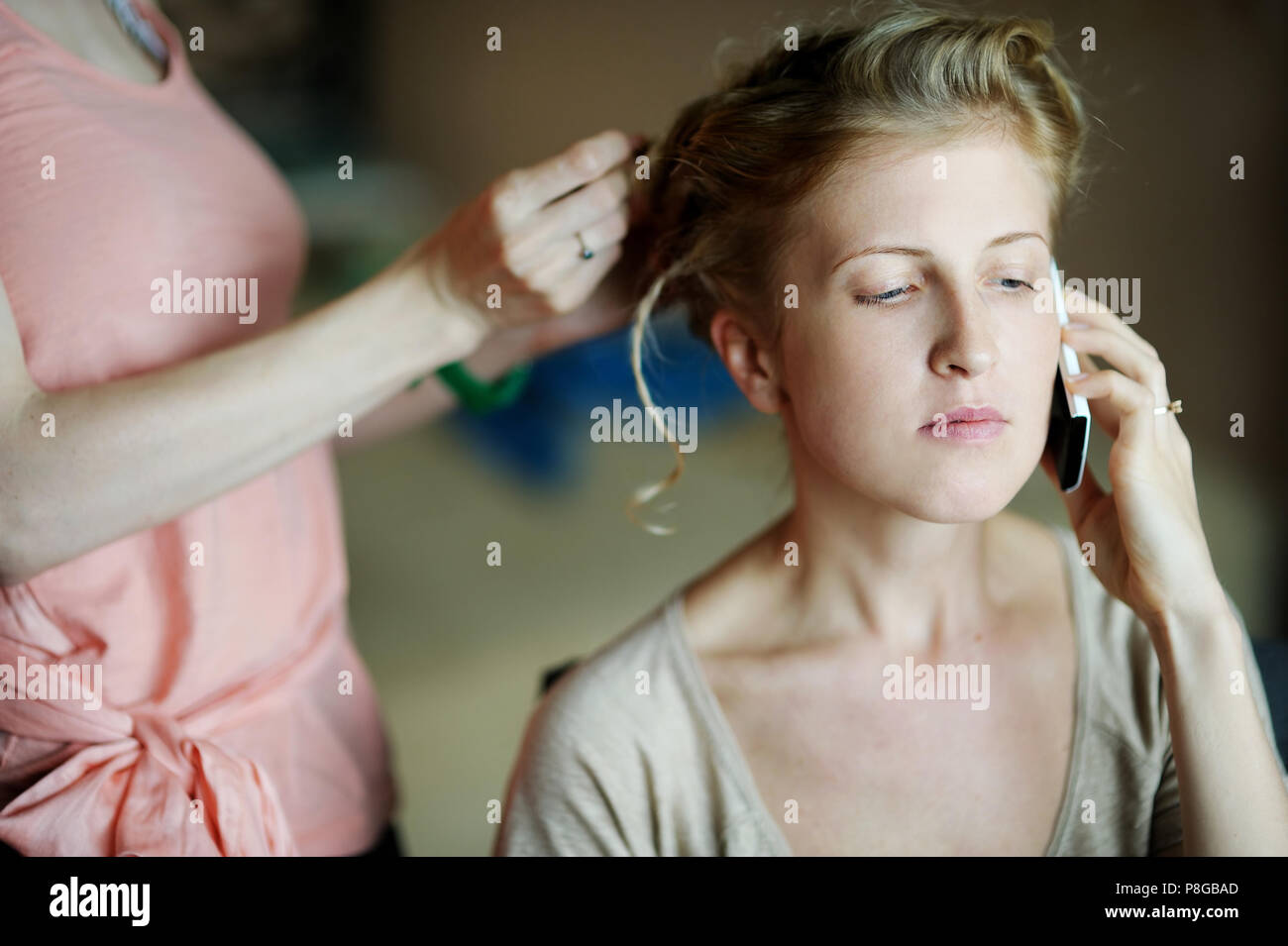 Getting her hair done hi-res stock photography and images - Alamy