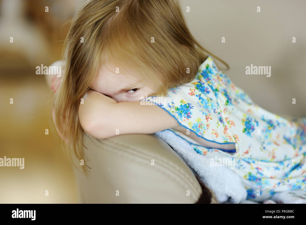 Little angry girl portrait at home Stock Photo - Alamy