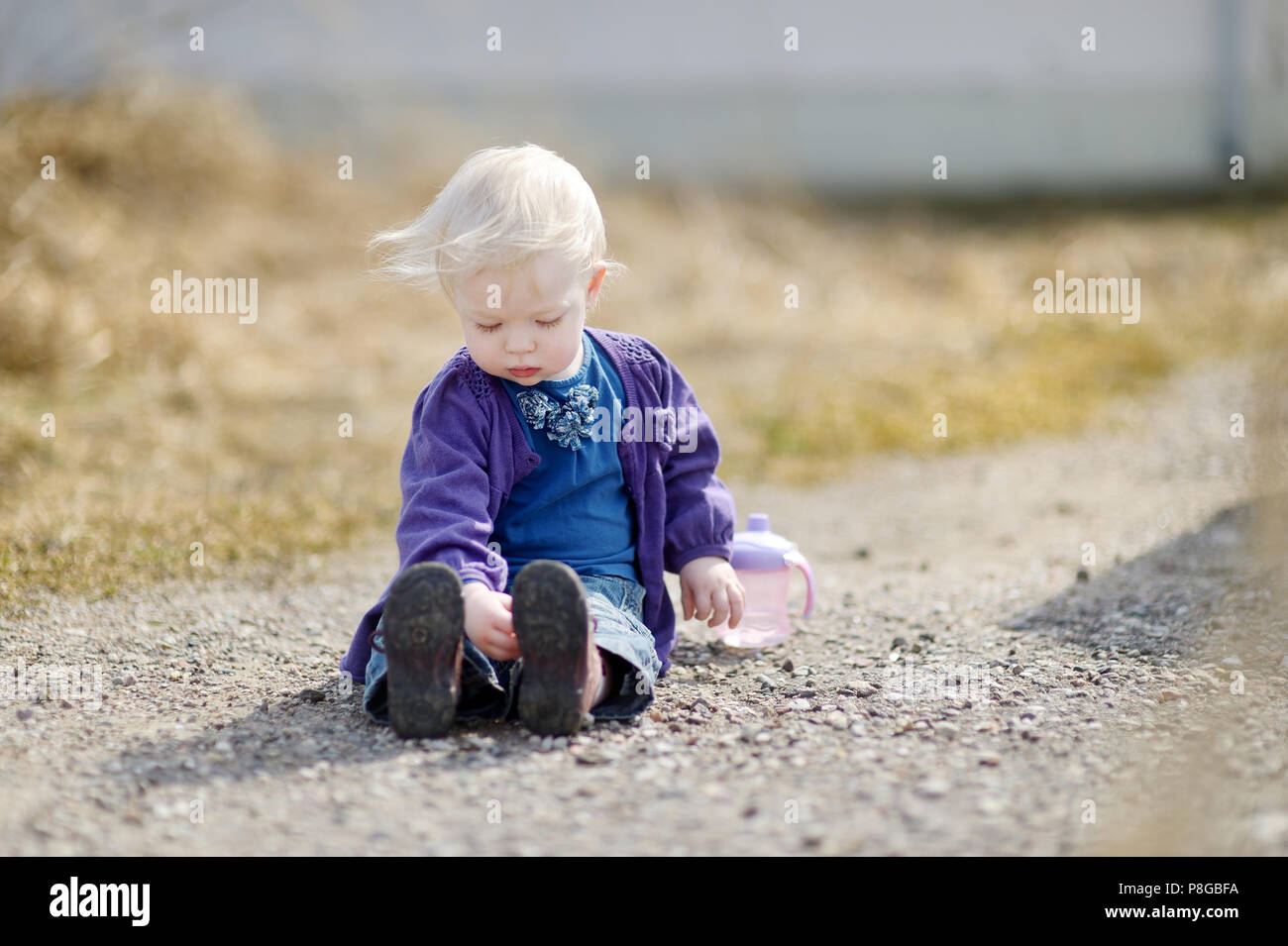 Adorable toddler girl portrait outdoors at summer Stock Photo - Alamy