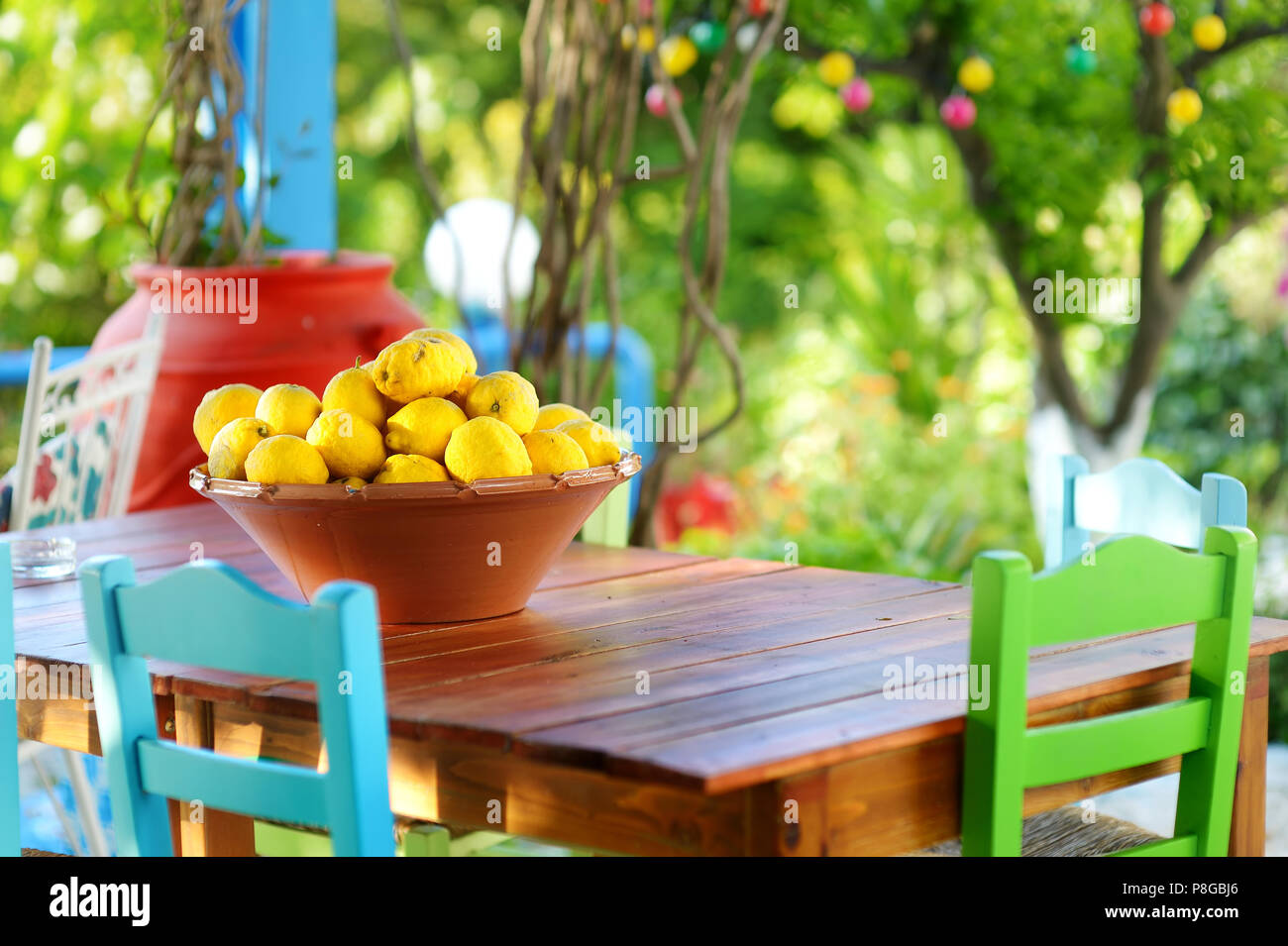 A dish of lemons in typical greek outdoor cafe on Kos island Stock ...