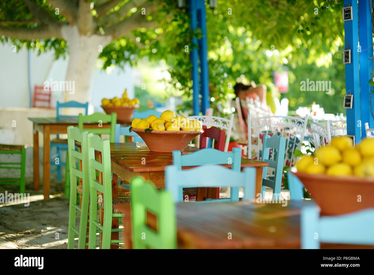 A dish of lemons in typical greek outdoor cafe on Kos island Stock ...