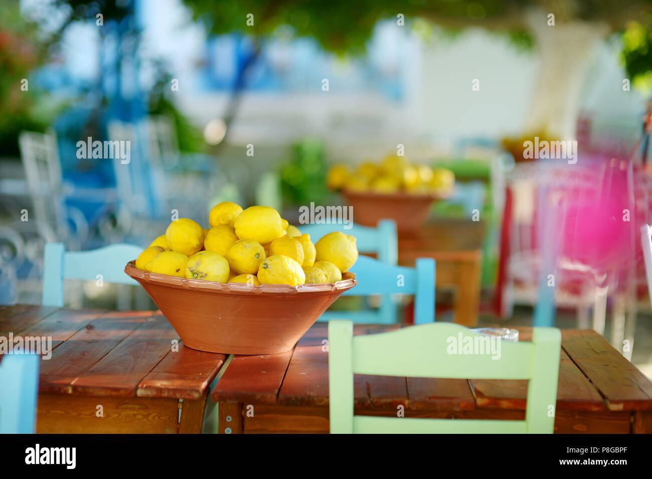 A dish of lemons in typical greek outdoor cafe on Kos island Stock ...
