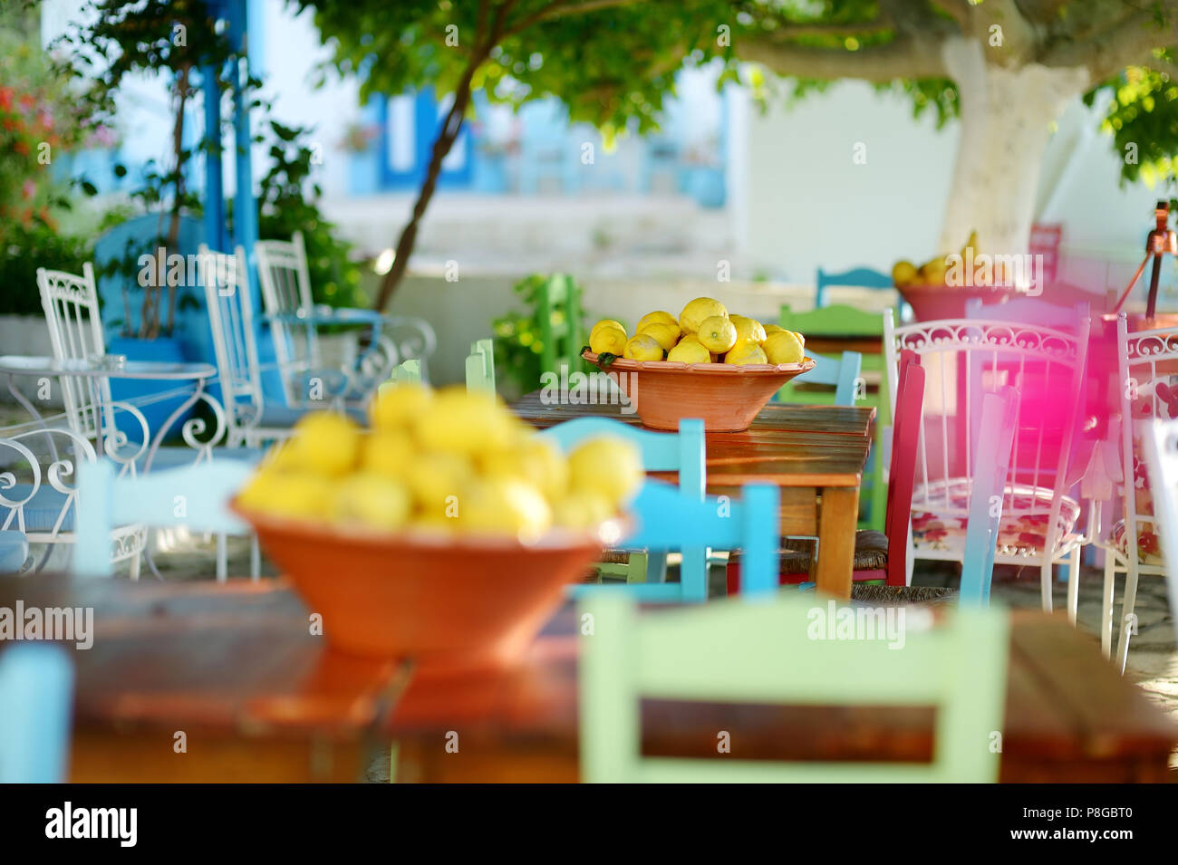 A dish of lemons in typical greek outdoor cafe on Kos island Stock ...