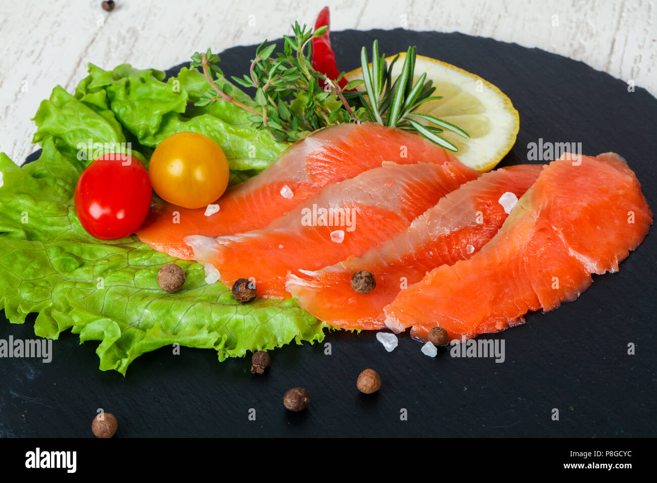 Raw trout fillet with salt and spices Stock Photo - Alamy