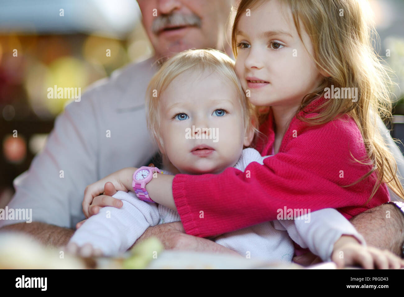 Happy grandfather two granddaughters hi-res stock photography and ...