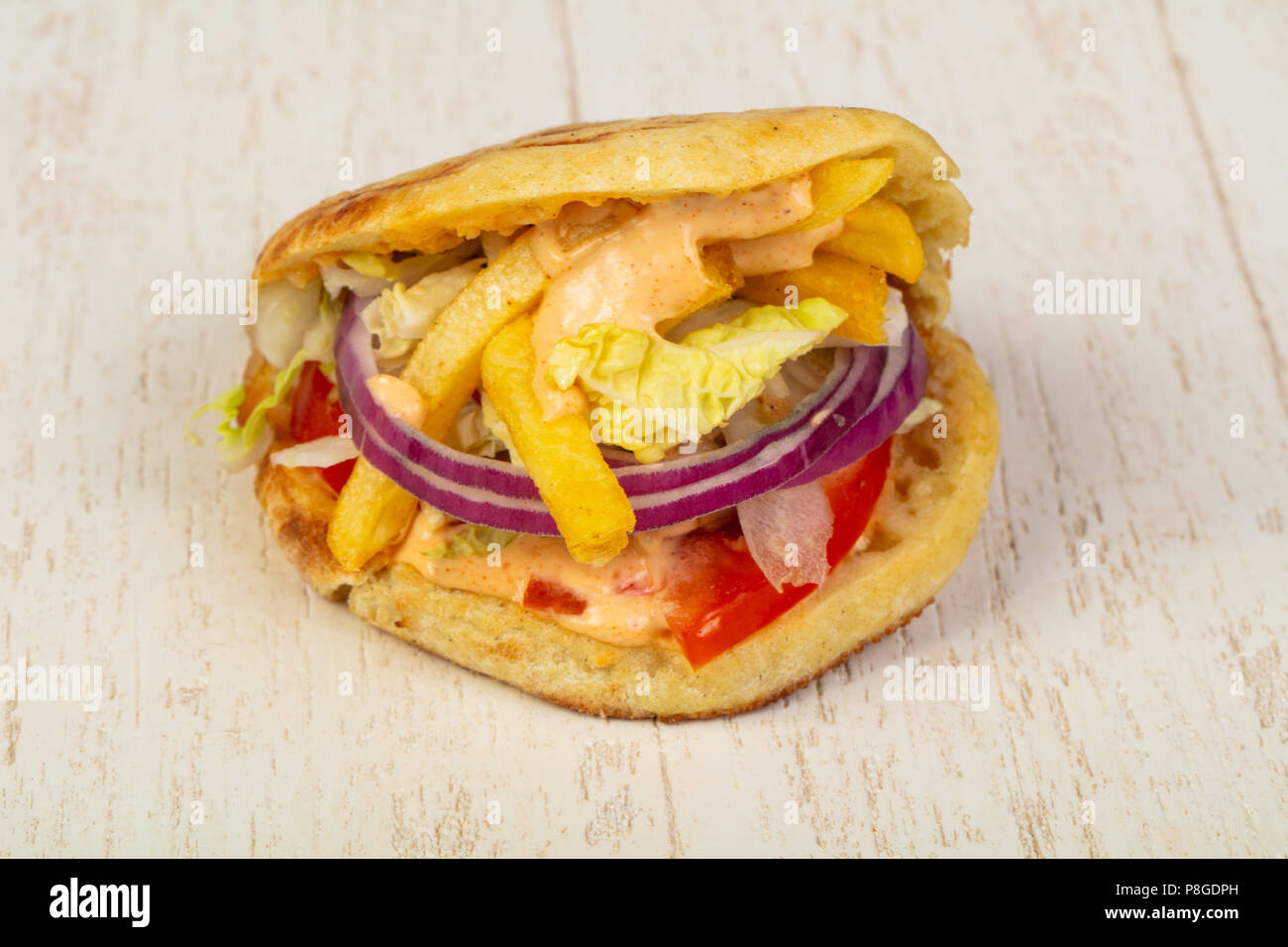 Tasty mini-gyros with onion, fries, tomatoes, lettuce and meat Stock ...
