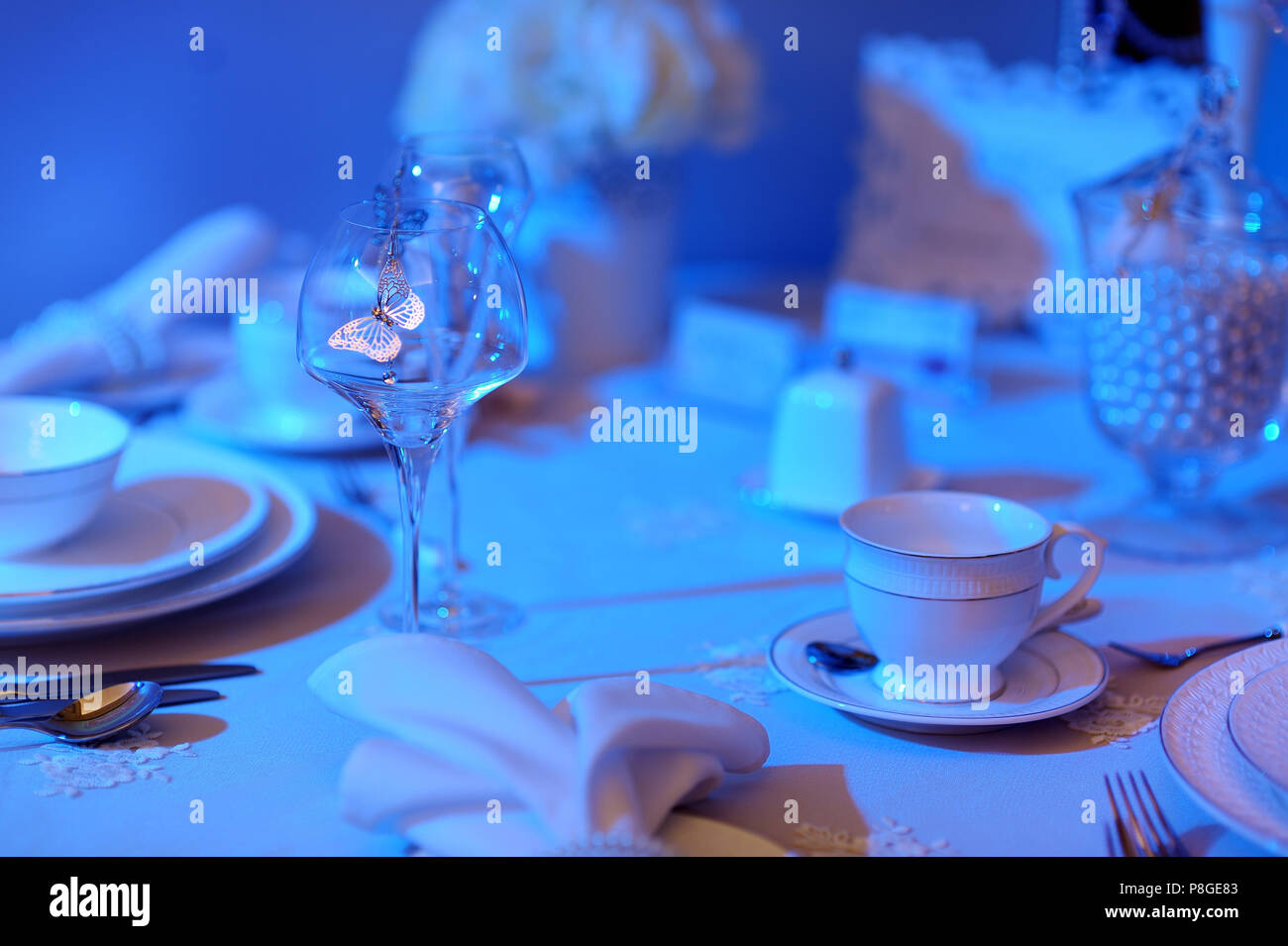 Blue table set for an event party or wedding reception Stock Photo - Alamy