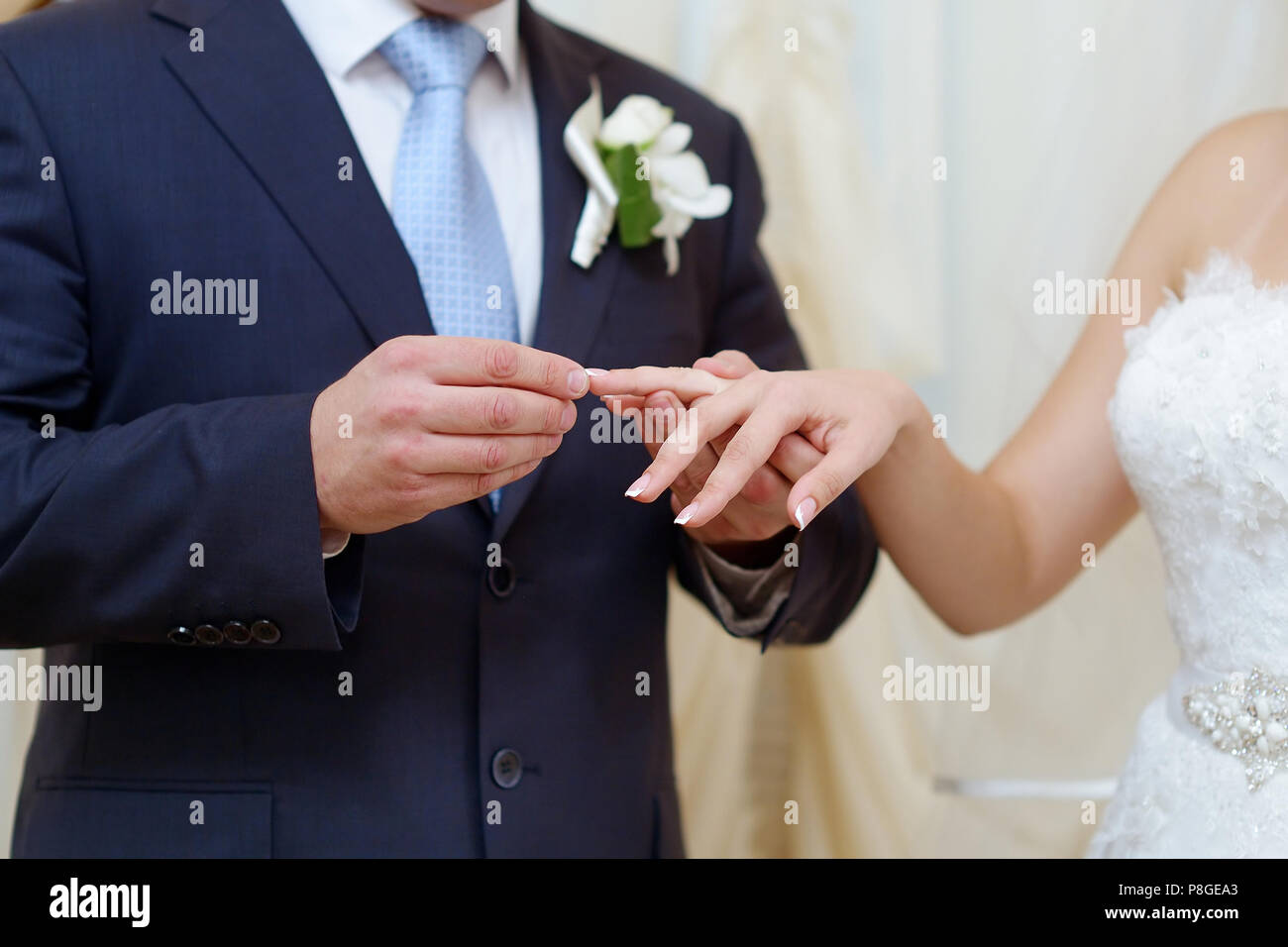 Girl putting on ring hi-res stock photography and images - Alamy