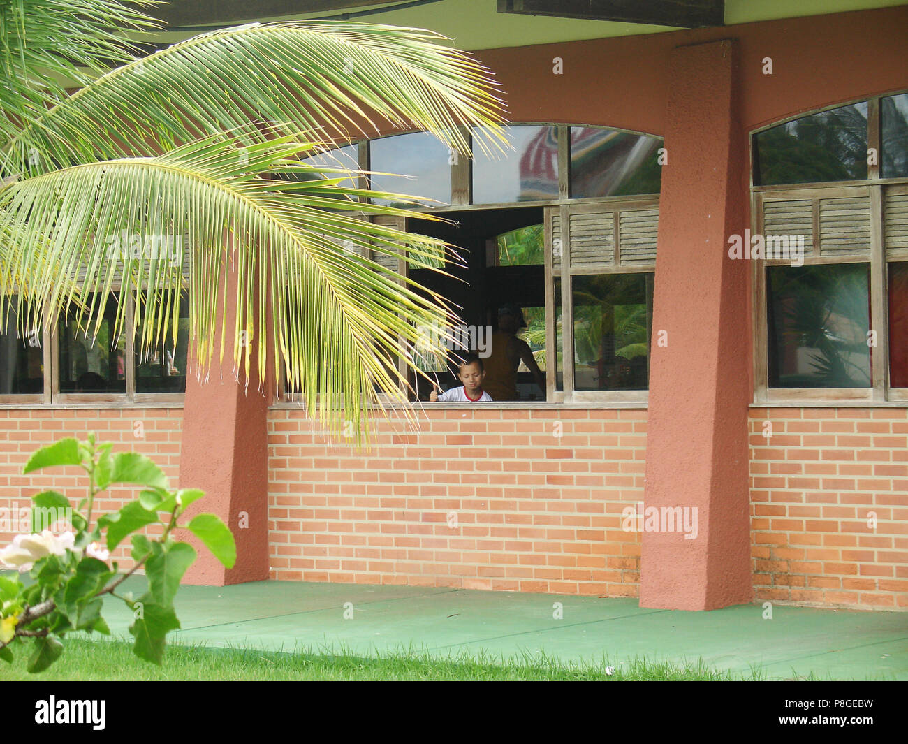 Child, window, house, São Paulo, Brazil.Child, window, house, São Paulo ...