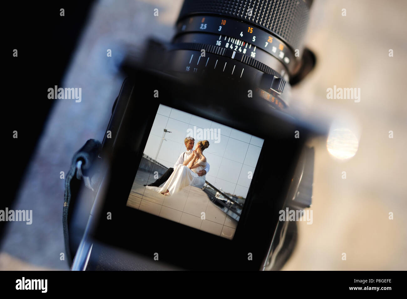 Shooting a wedding with a vintage oldschool camera Stock Photo - Alamy